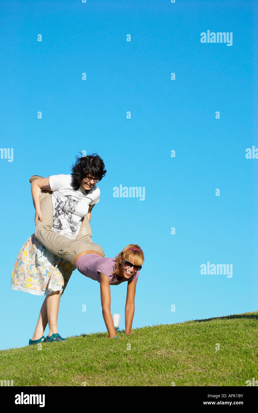 Friends being playful Stock Photo - Alamy