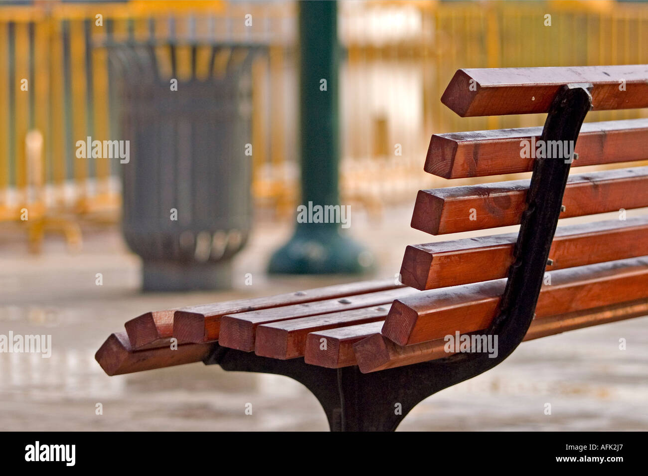 A bench in an urban setting Stock Photo - Alamy