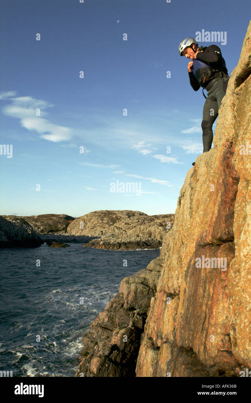 Cliff jumping in Tiree Scotland Scottish isles Hebridean Isles Hebrides ...