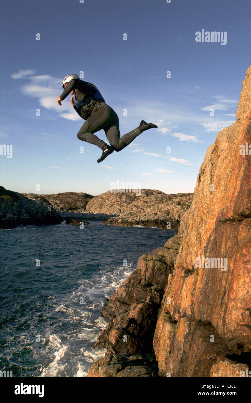 Cliff jumping in Tiree Scotland Scottish isles Hebridean Isles Hebrides ...