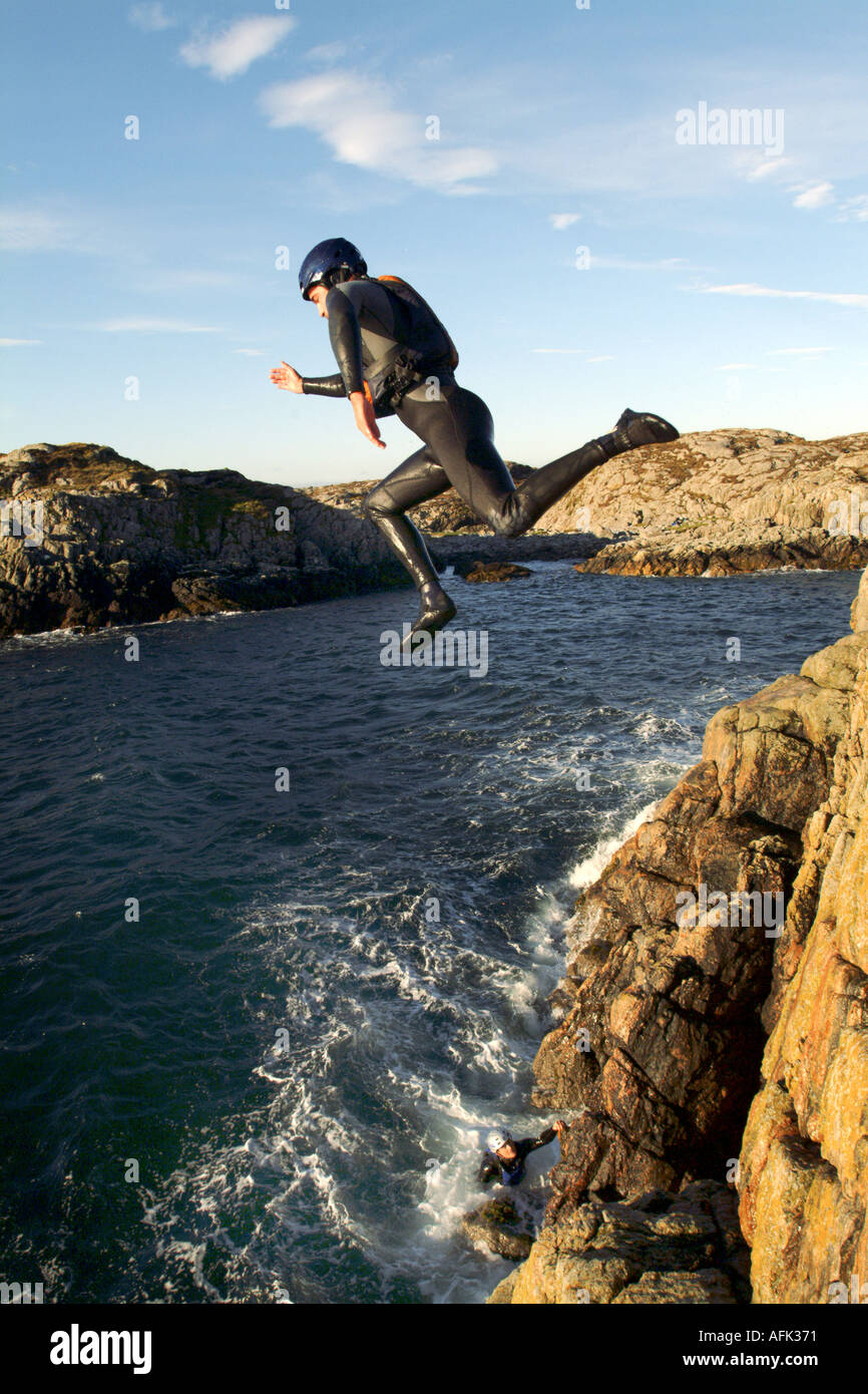 Cliff jumping in Tiree Scotland Scottish isles Hebridean Isles Hebrides ...