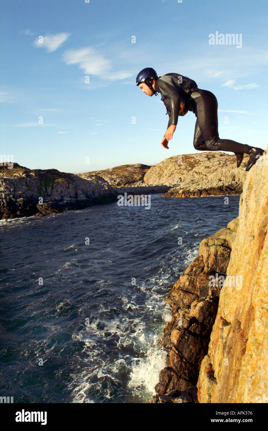 Cliff jumping in Tiree Scotland Scottish isles Hebridean Isles Hebrides ...