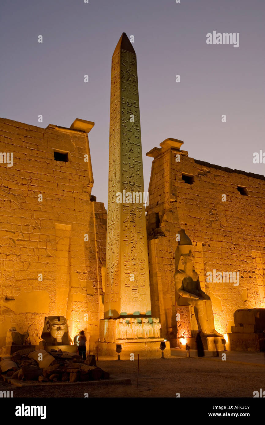 Luxor Temple illuminated at night. The obelisk is one of a pair, the ...
