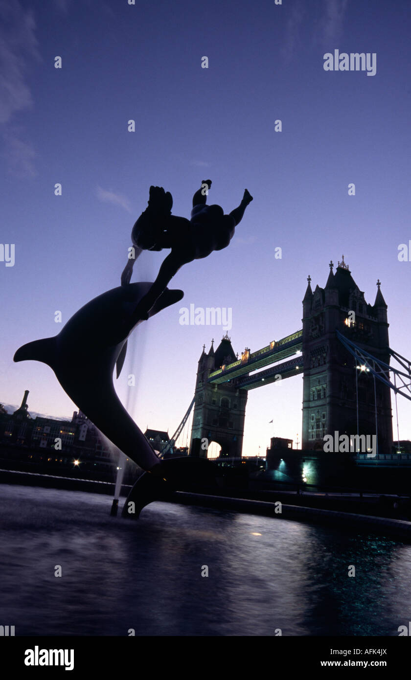 Dolphin and boy statue hi-res stock photography and images - Alamy