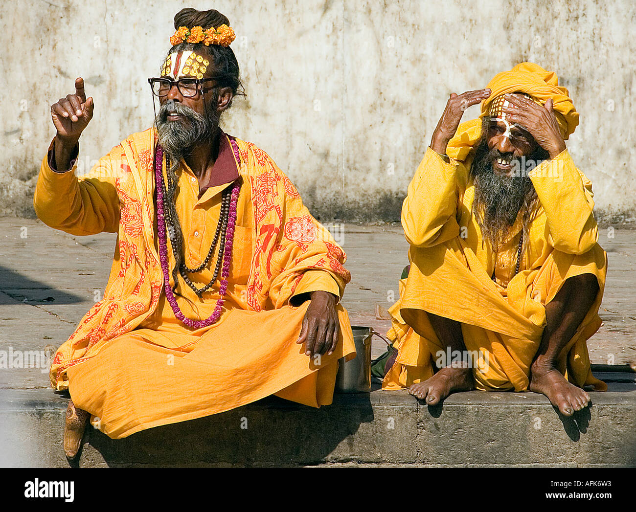 2 two siddhu sadhu holy man Patan Durbar Square temple buildings ...