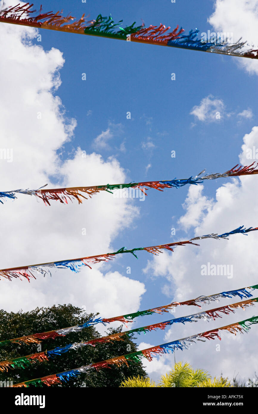 Car dealership streamers in sky with clouds Stock Photo - Alamy