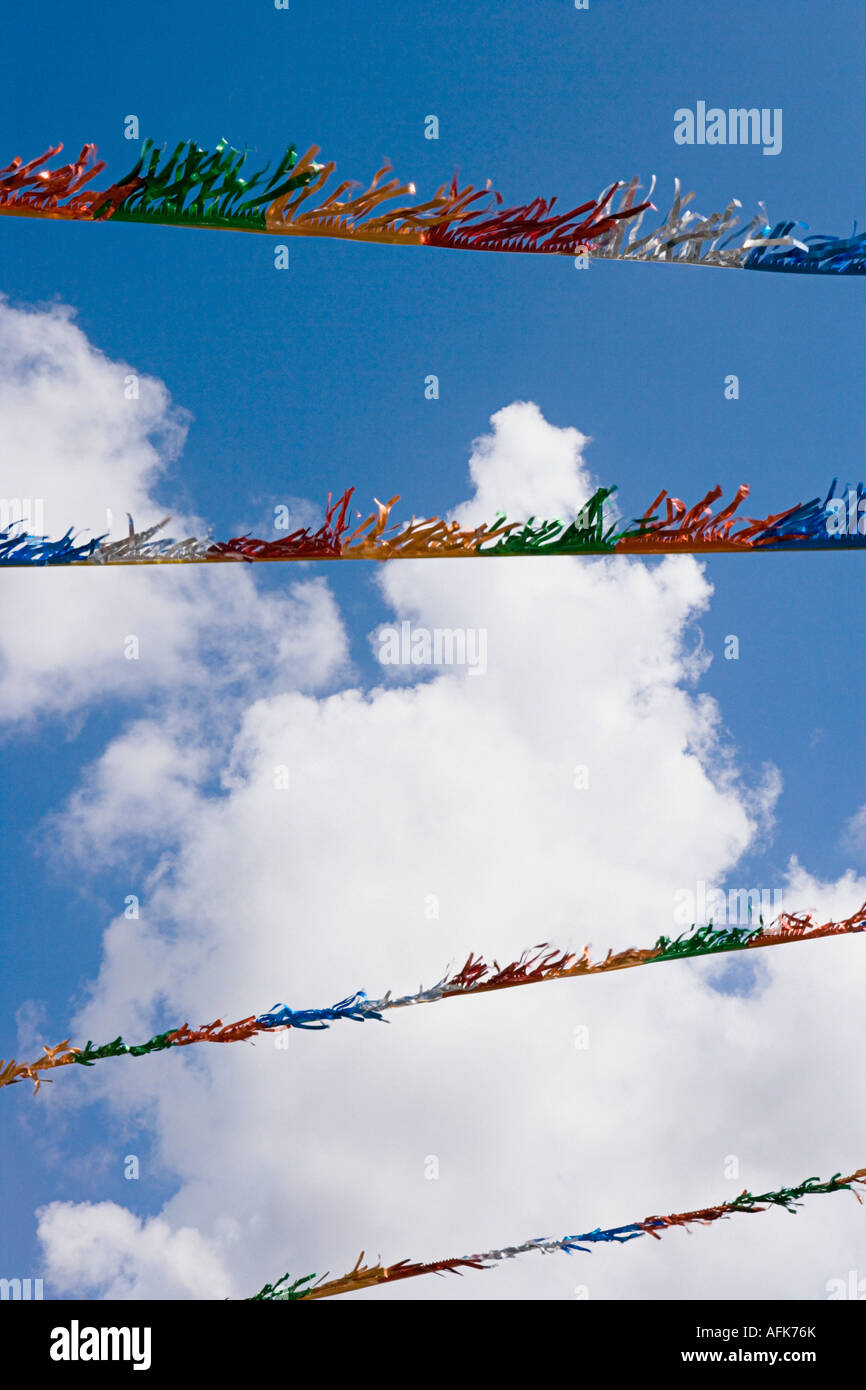 Car dealership streamers in sky with clouds Stock Photo - Alamy