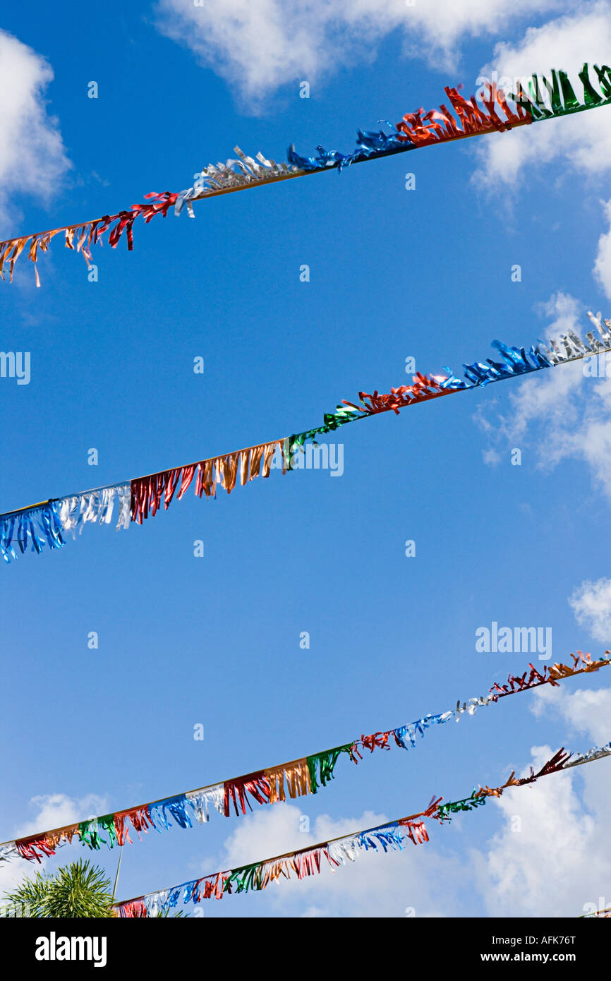 Car dealership streamers in sky with clouds Stock Photo - Alamy