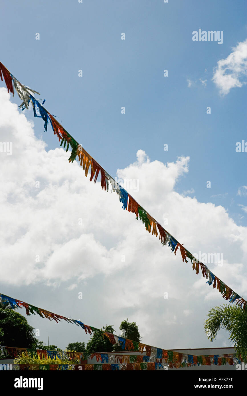 Car dealership streamers in sky with clouds Stock Photo - Alamy