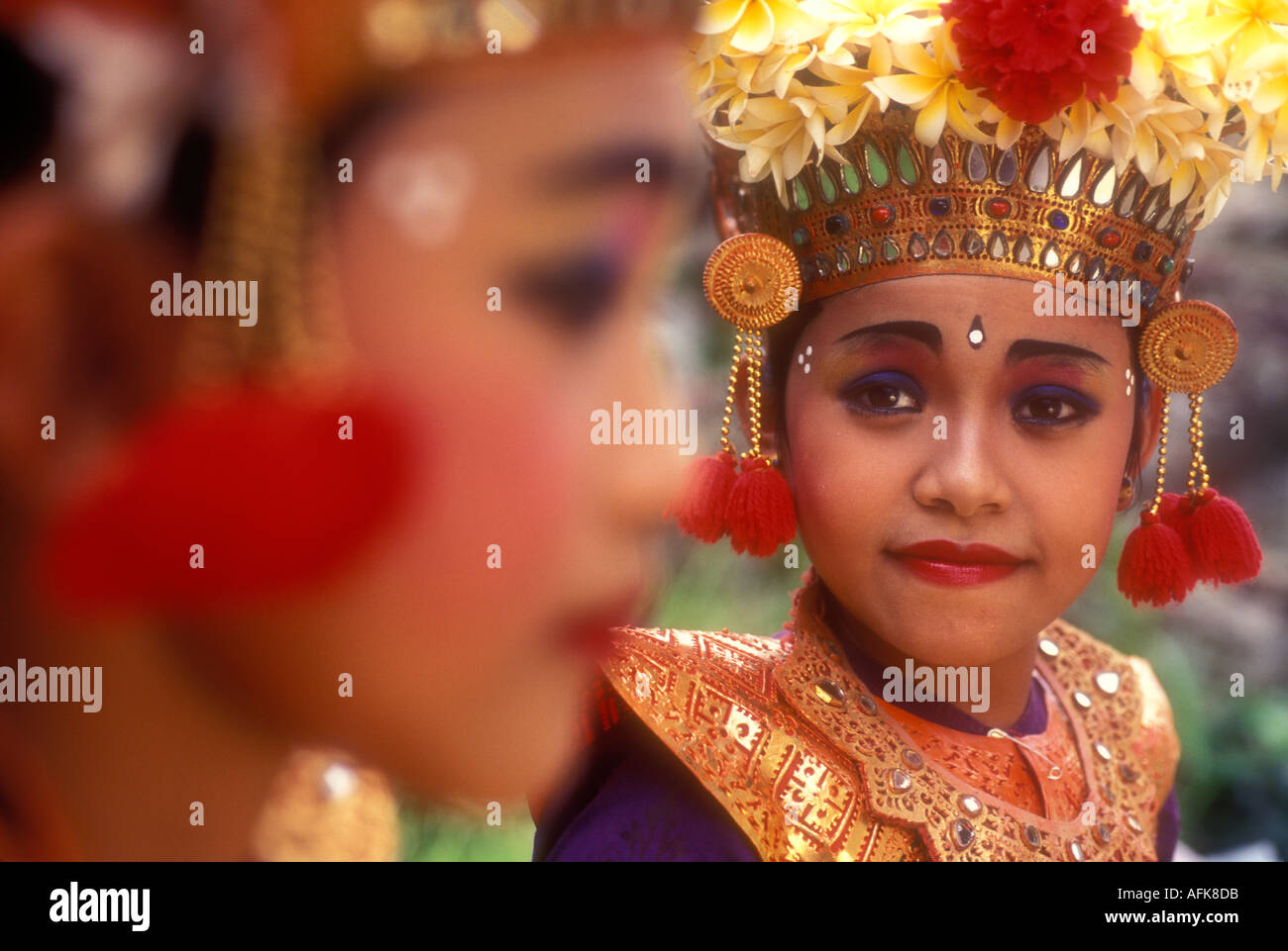 Young Legong dancers in full costume on the island of Bali in Indonesia ...