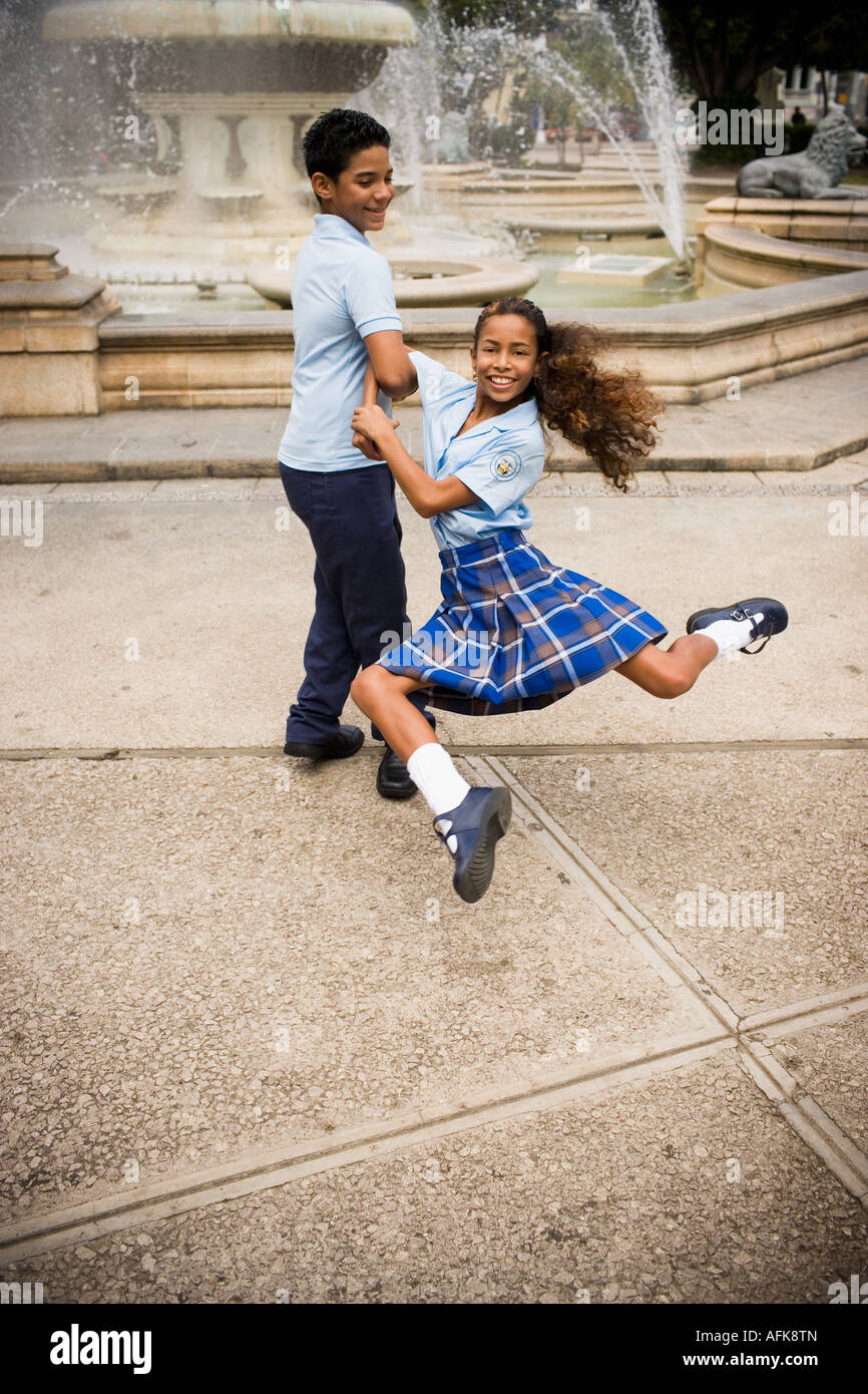 School children dancing salsa in center plaza Stock Photo - Alamy