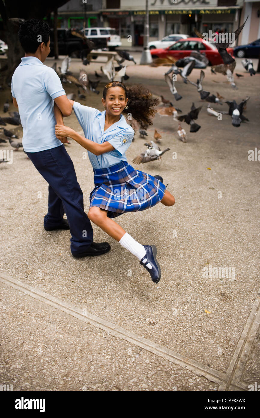 School children dancing salsa in center plaza Stock Photo - Alamy