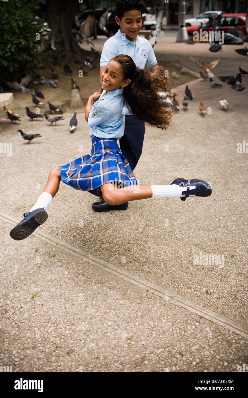 School children dancing salsa in center plaza Stock Photo - Alamy