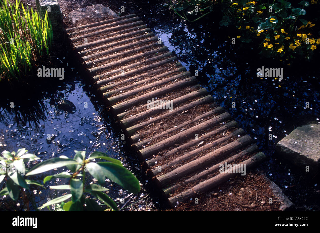 floating wood bridge Stock Photo - Alamy