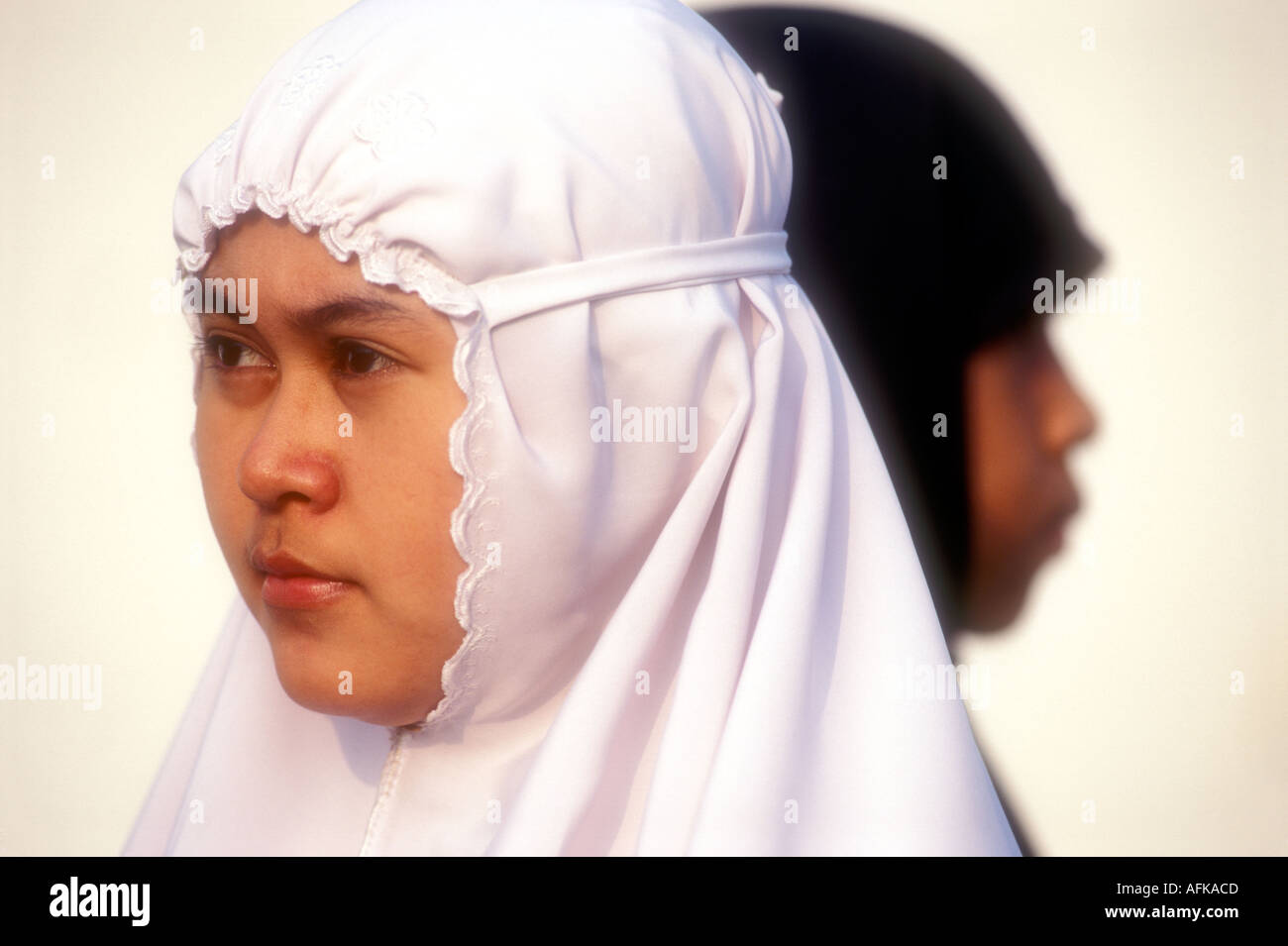 Two Muslim women with traditional head scarves in Java Indonesia Model ...