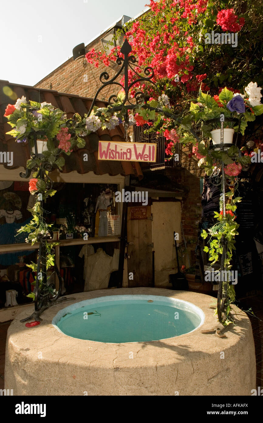 Wishing well in front house hi-res stock photography and images - Alamy