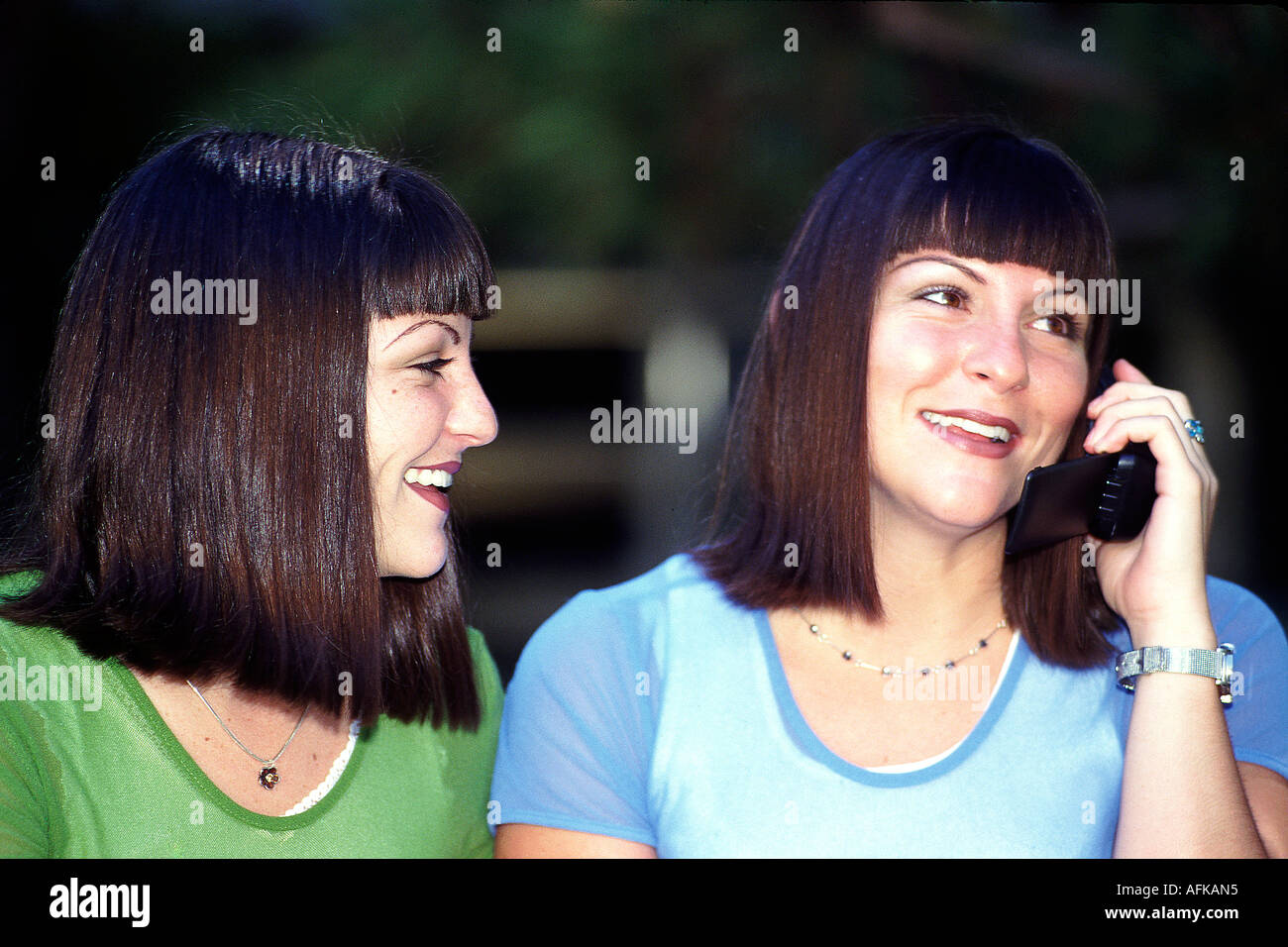 Identical twins girls hi-res stock photography and images - Alamy