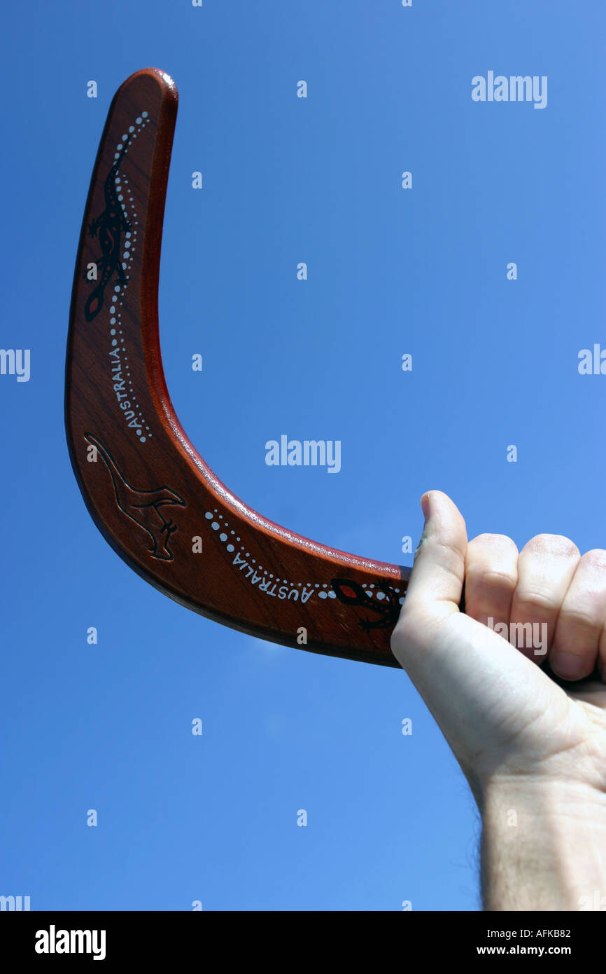 Boomerang and hand Stock Photo - Alamy