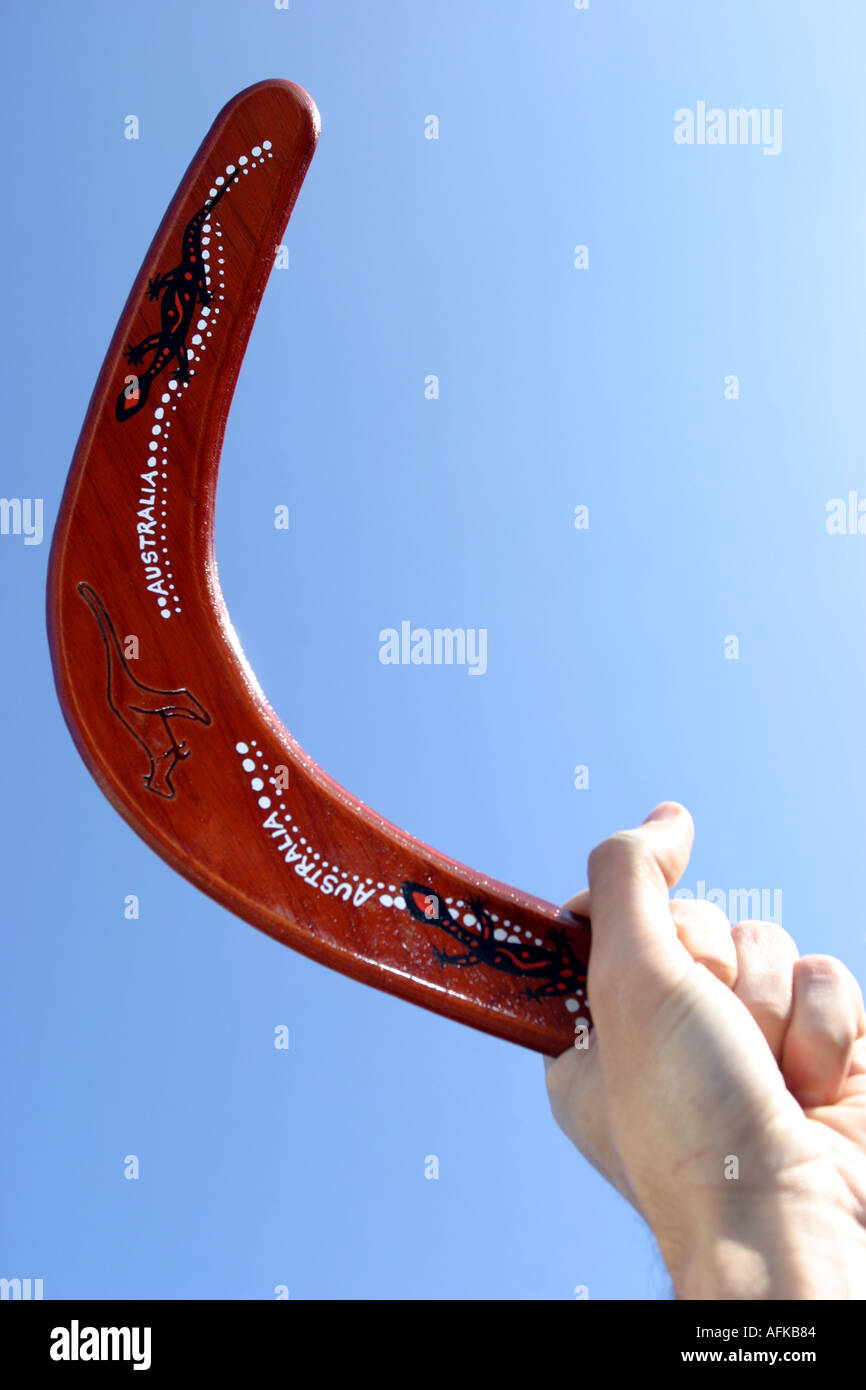 Boomerang and hand Stock Photo - Alamy