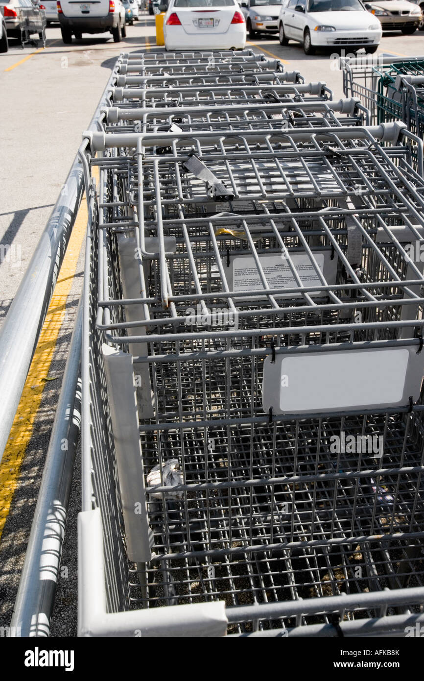 Shopping carts in parking lot Stock Photo - Alamy