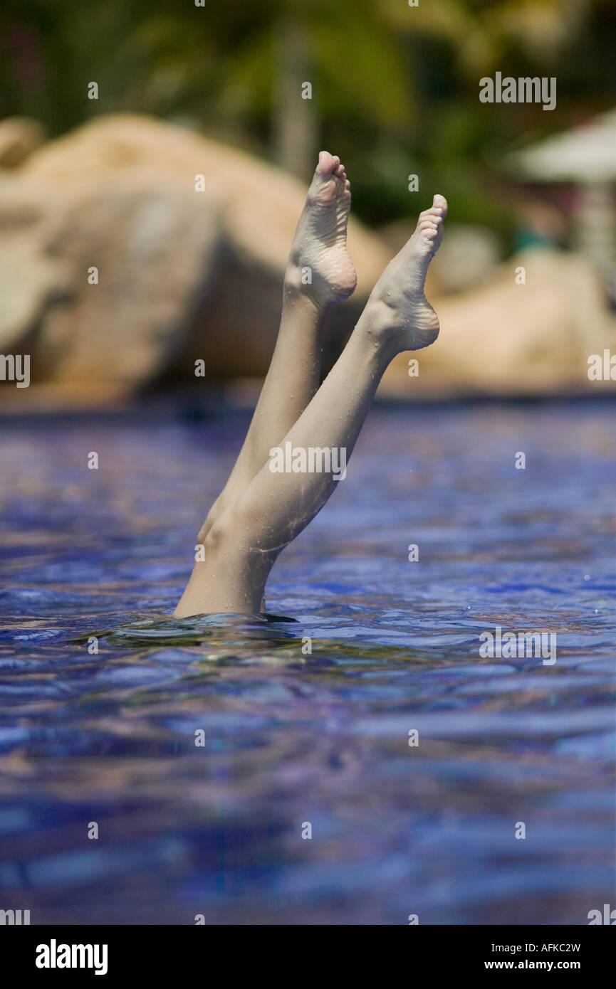 Girl diving into water, Cabo San Lucas, Mexico Stock Photo - Alamy