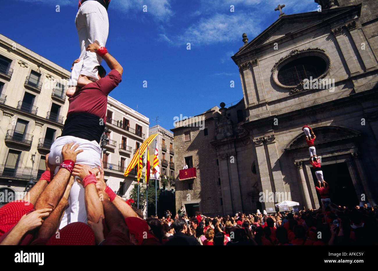 Teams of castellers build human towers during the festival of La Merce ...