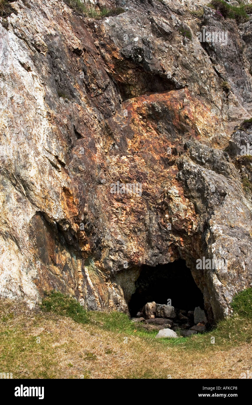 Copper rich veins of rock at tunnel entrance in disused coppermine ...