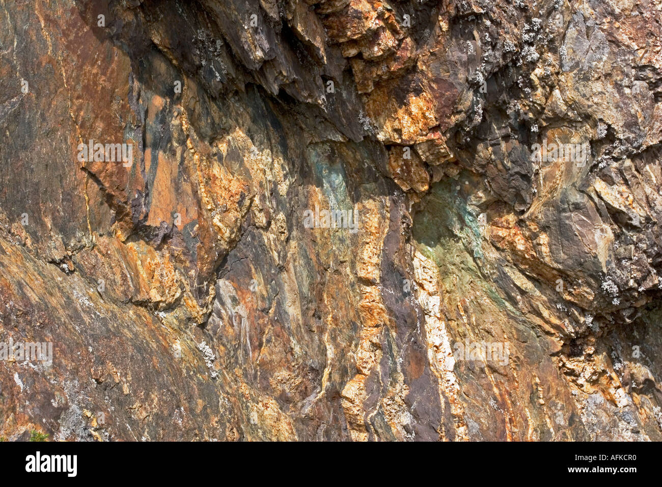 Copper rich veins of rock in disused coppermine, Allihies, County Cork ...
