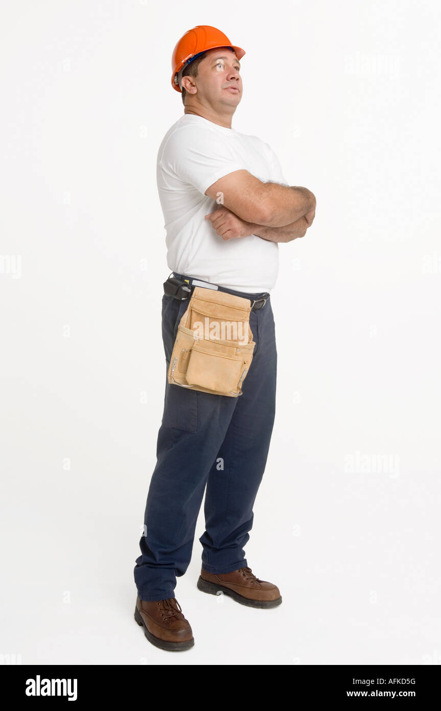 Construction worker, arms crossed Stock Photo - Alamy