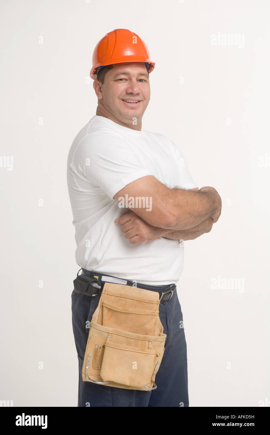 Construction worker, arms crossed Stock Photo - Alamy