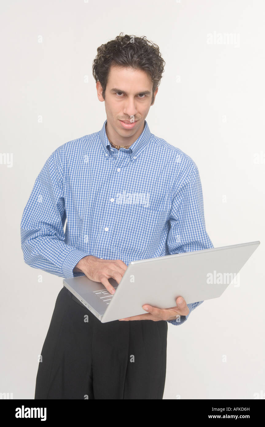 Man holding laptop Stock Photo - Alamy