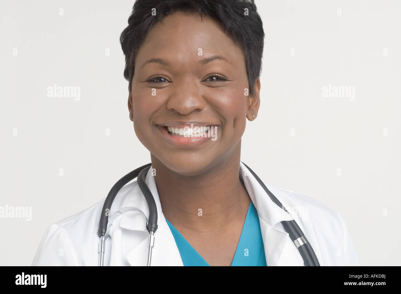 Portrait of doctor smiling Stock Photo - Alamy