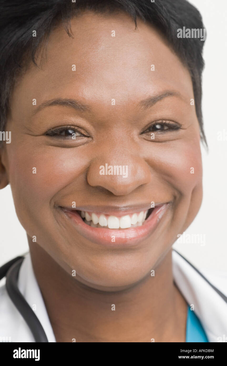 Portrait of doctor smiling Stock Photo - Alamy