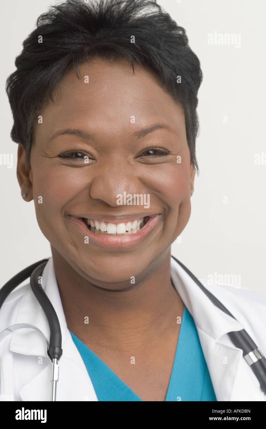 Portrait of doctor smiling Stock Photo - Alamy