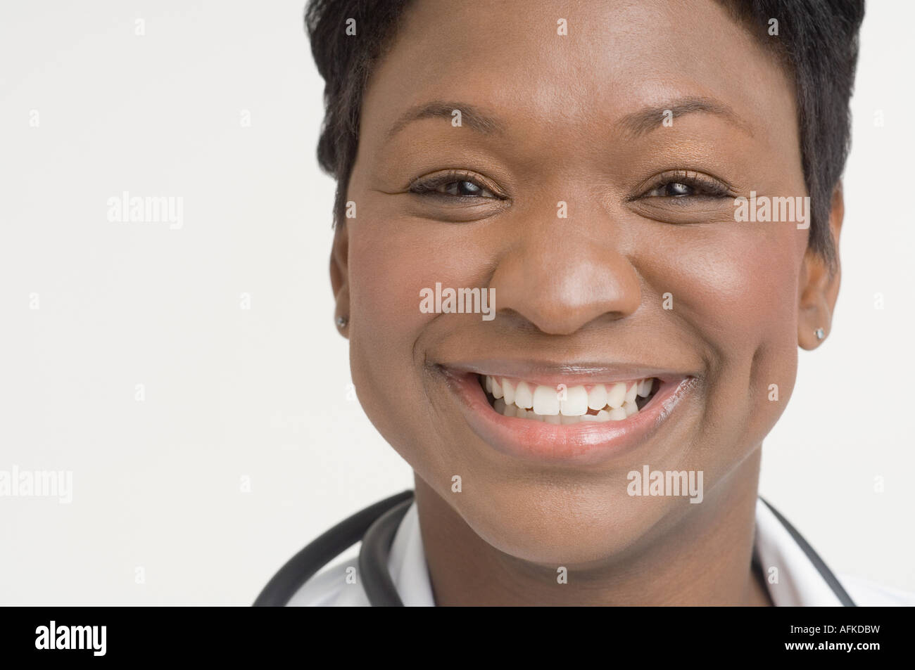 Portrait of doctor smiling Stock Photo - Alamy