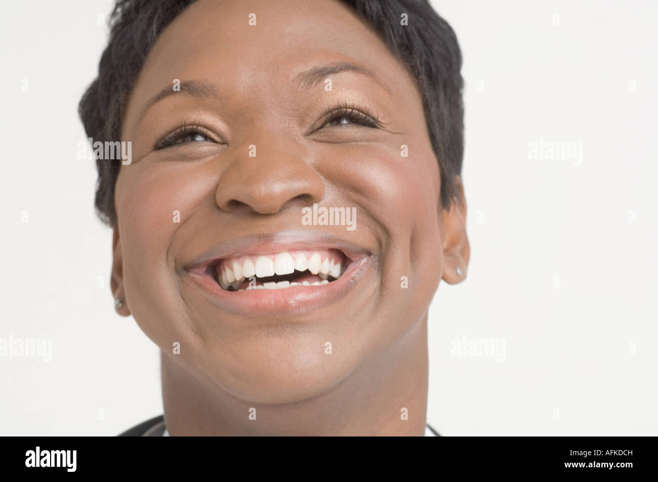 Portrait of doctor looking up Stock Photo - Alamy