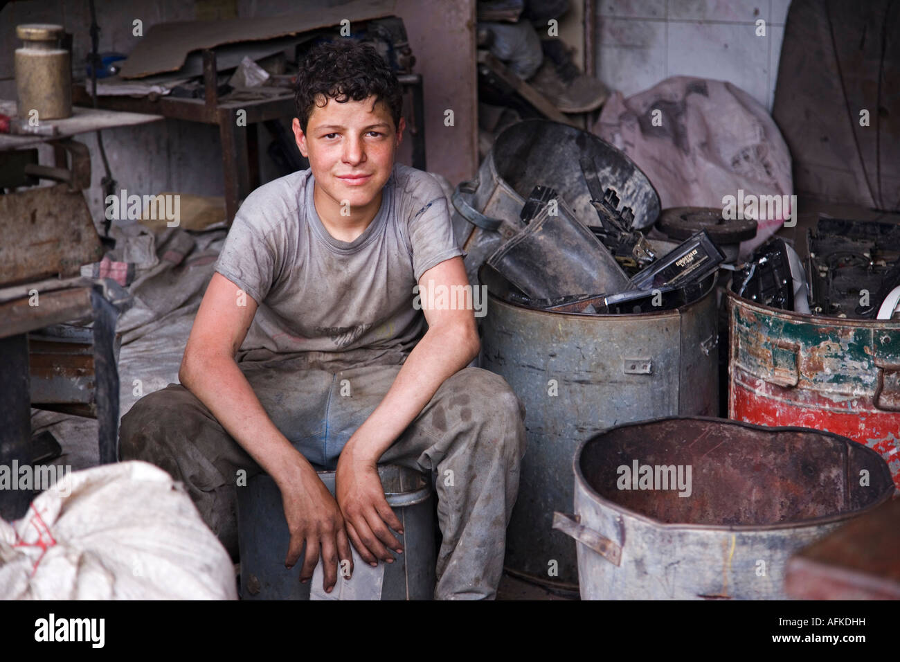A boy in a metal workshop, Aleppo, Syria Stock Photo - Alamy