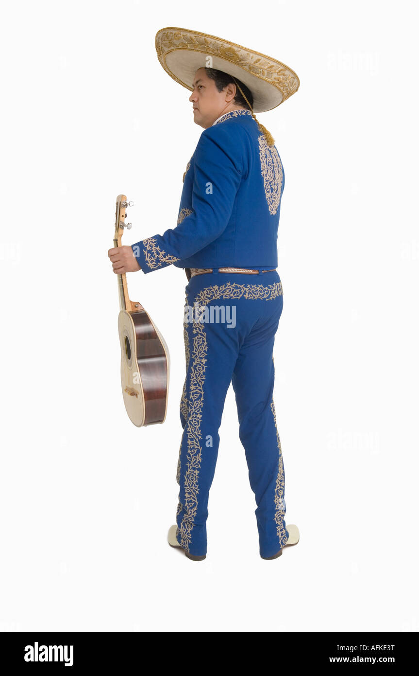 Portrait of Mariachi playing guitar and singing Stock Photo - Alamy