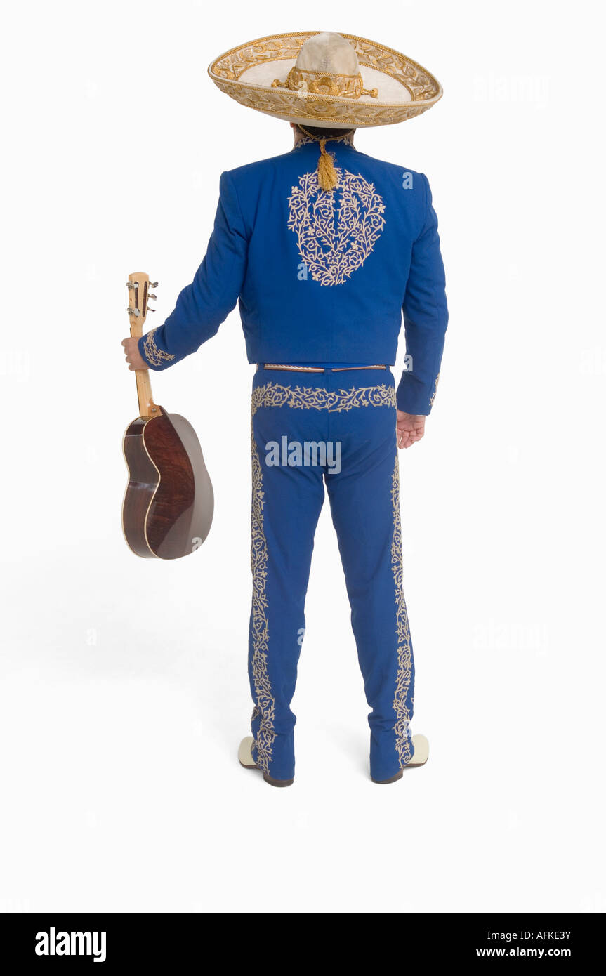 Portrait of Mariachi playing guitar and singing Stock Photo - Alamy