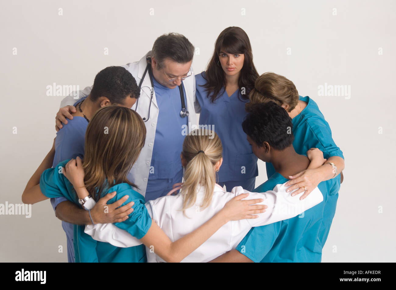 Group portrait of nurses and doctors in huddle Stock Photo - Alamy