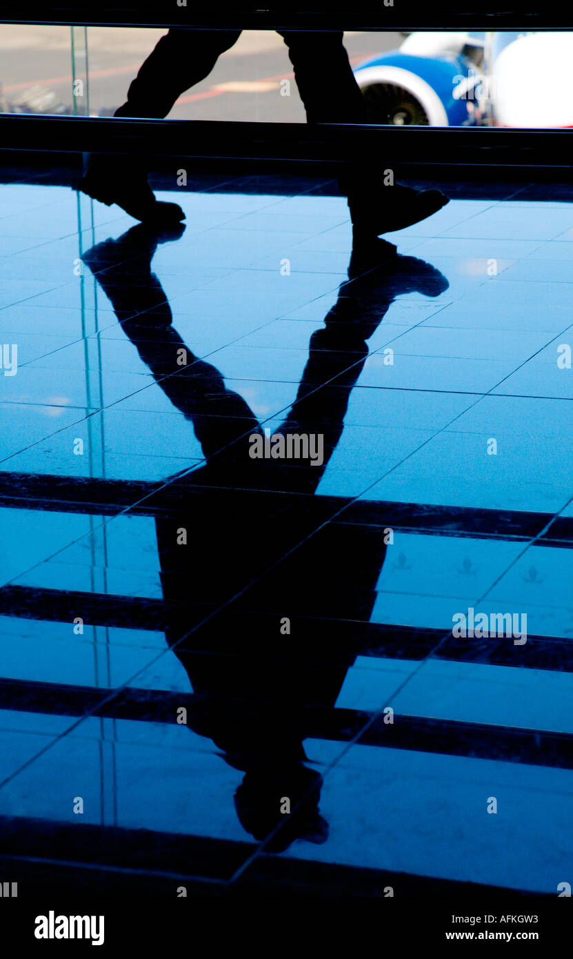 Reflection of person walking at Guanajuato Airport Leon Mexico Stock ...