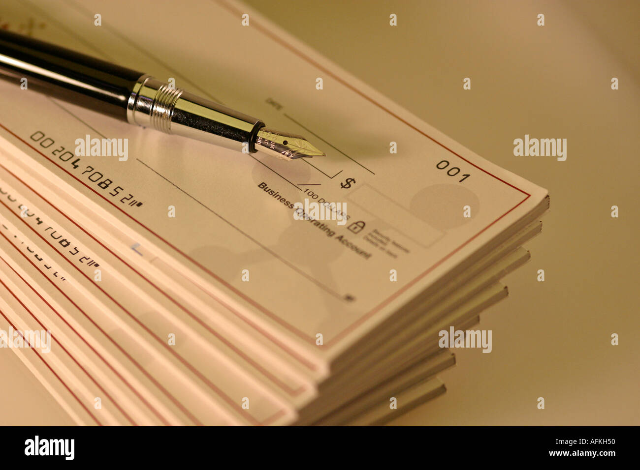Cheque book fountain pen hi-res stock photography and images - Alamy