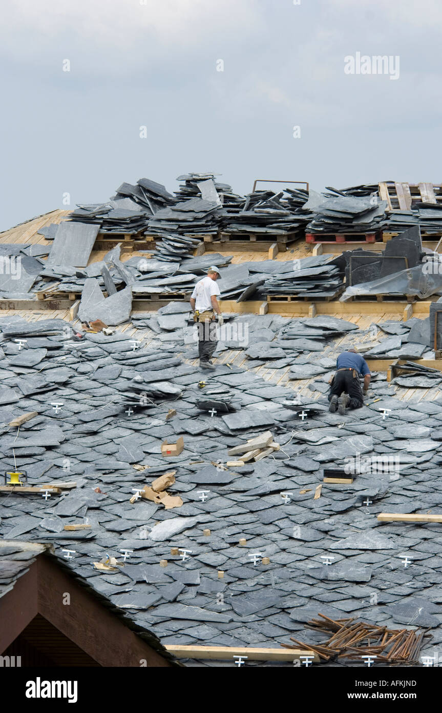 Slate roof laying hi-res stock photography and images - Alamy
