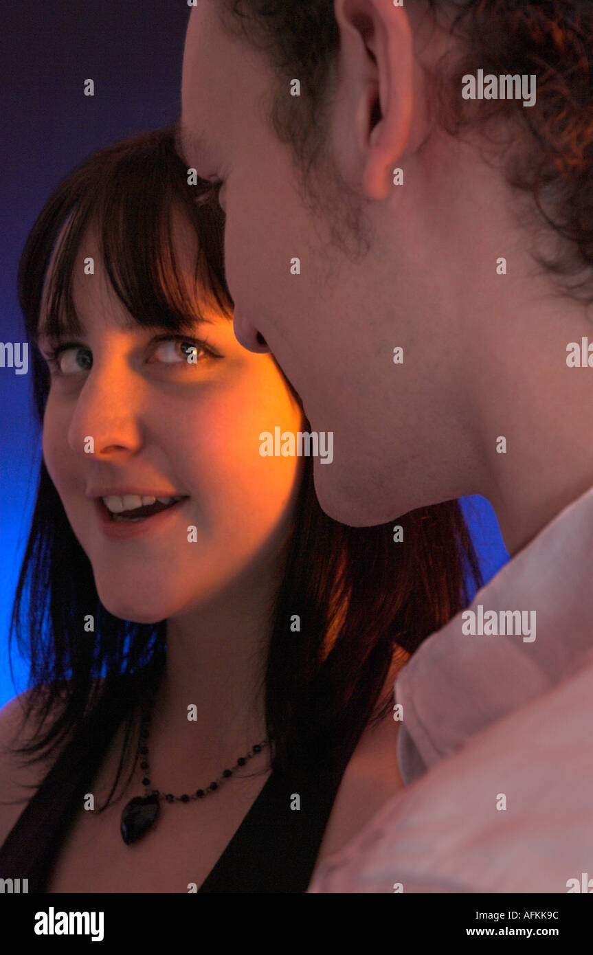 Man eyeing up woman hi-res stock photography and images - Alamy