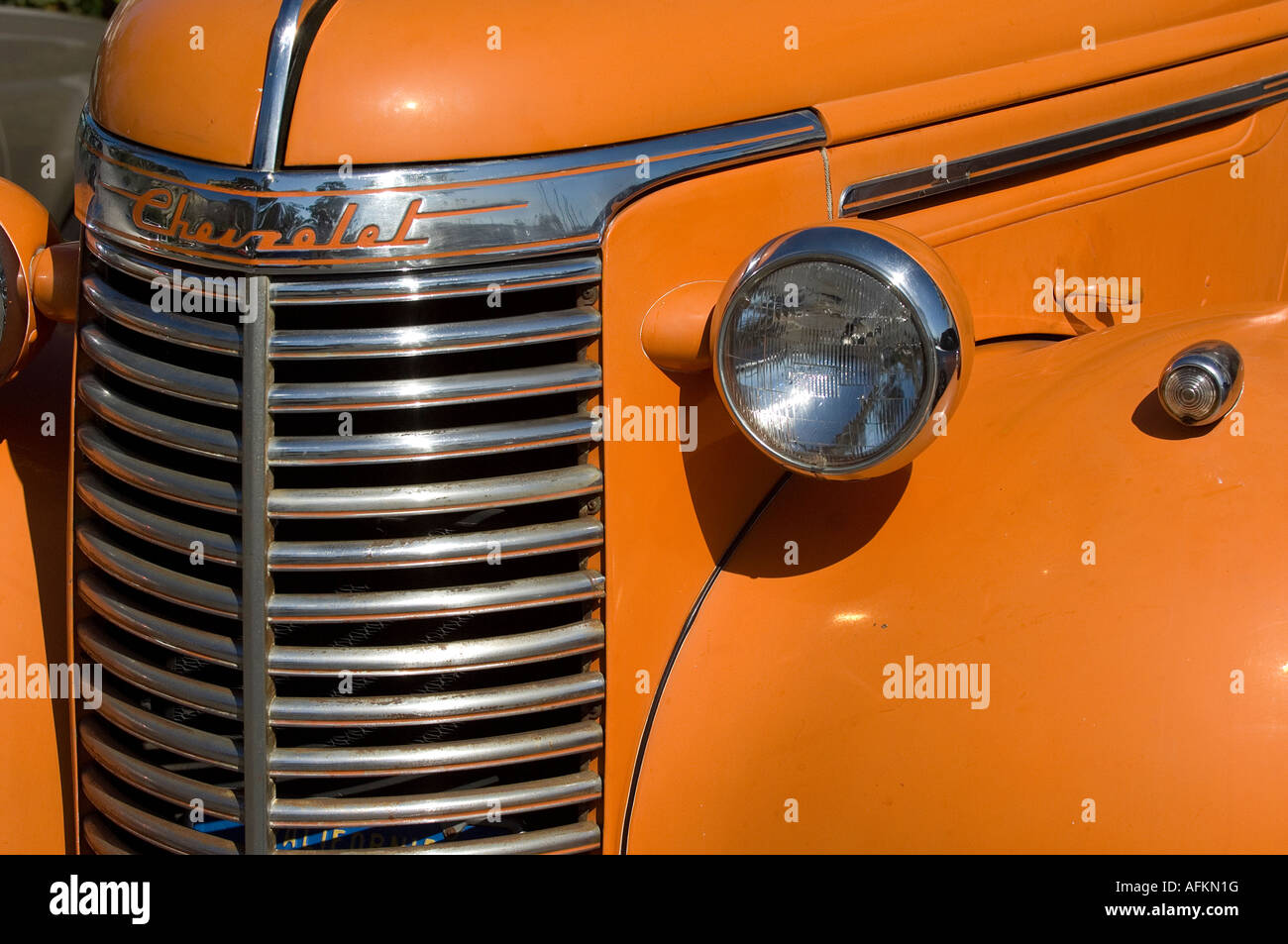 Orange Chevrolet Truck vintage antique Stock Photo - Alamy