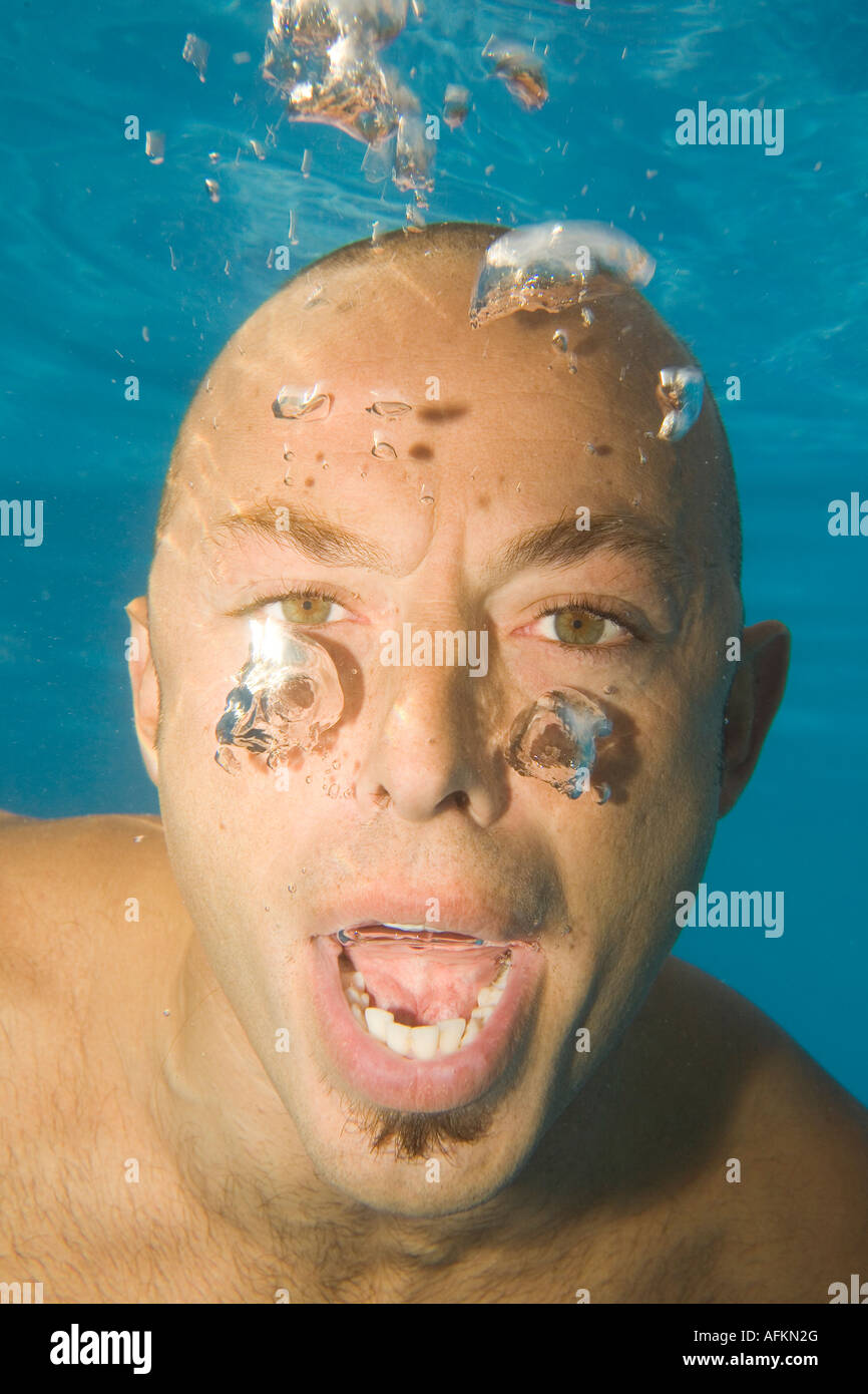 Man under water Stock Photo - Alamy