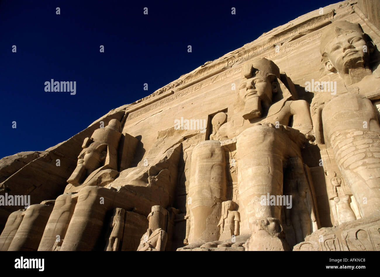 Four giant statues outside Ramses II Temple, Abu Simbel, Egypt Stock ...