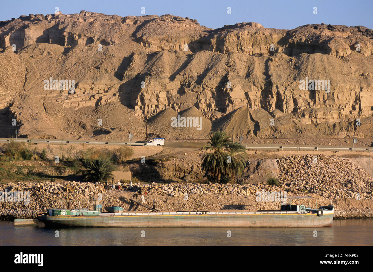 Docked barge on the River Nile, between Aswan and Kom Ombo, Egypt Stock ...