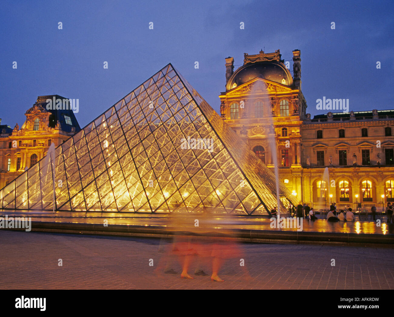 A view of the Louvre Museum along the Seine River in the heart of Paris ...