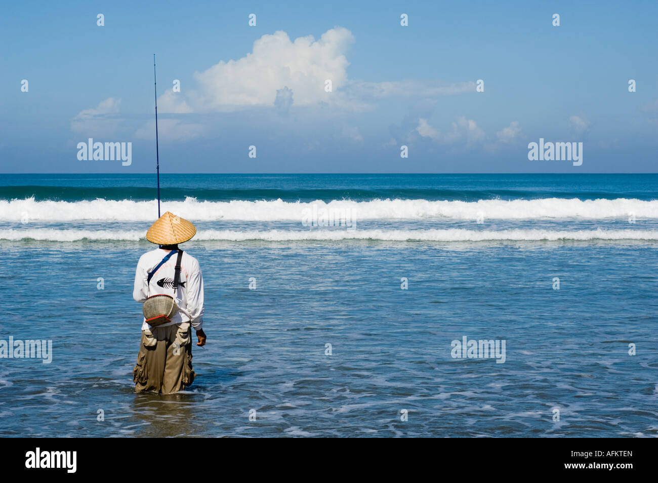 fisherman fishing in sea water Stock Photo - Alamy